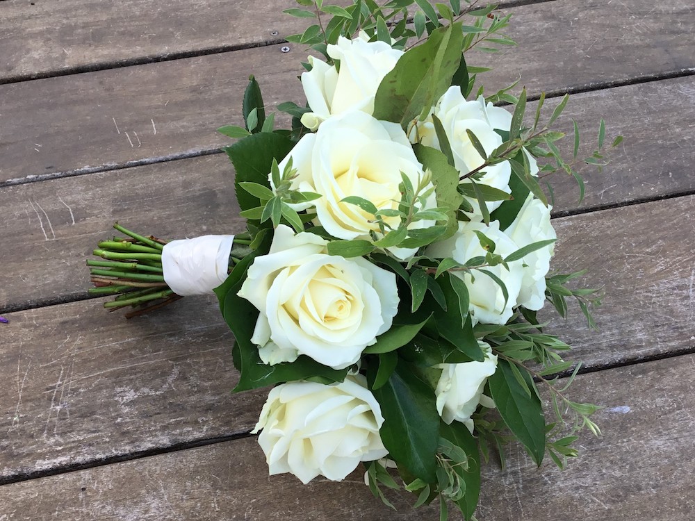 Classic and modern take on all white Avalanche rose wedding bouquet ...